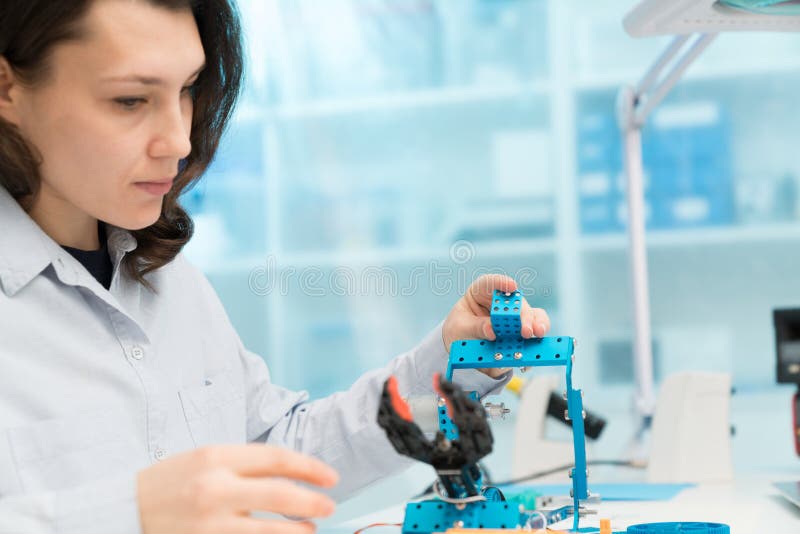 Student Woman in Robotics Laboratory Working on Project Mechatronics ...
