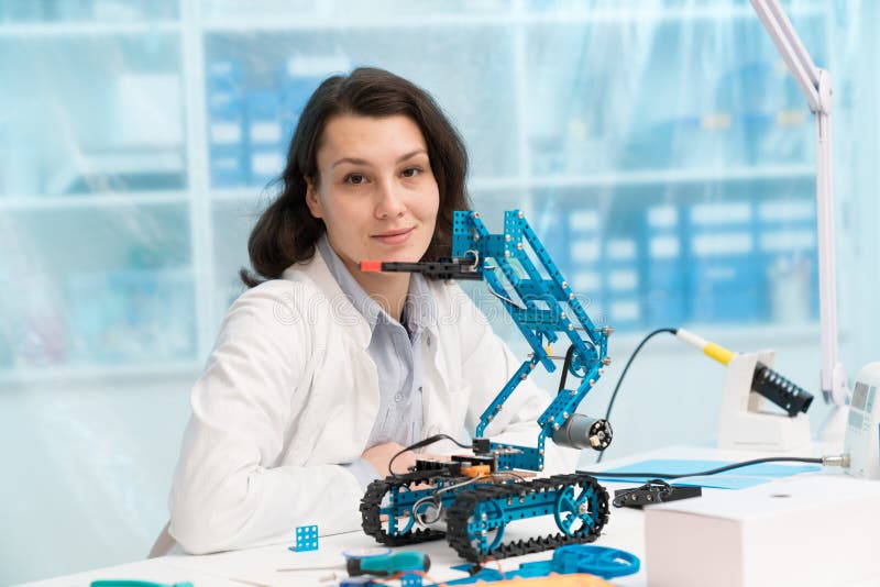 Student Woman in Robotics Laboratory Working on Project Mechatronics ...