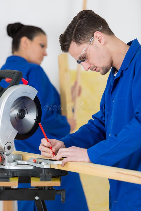 Student Woodworking Class Learning To Drill with Nails Stock Image ...