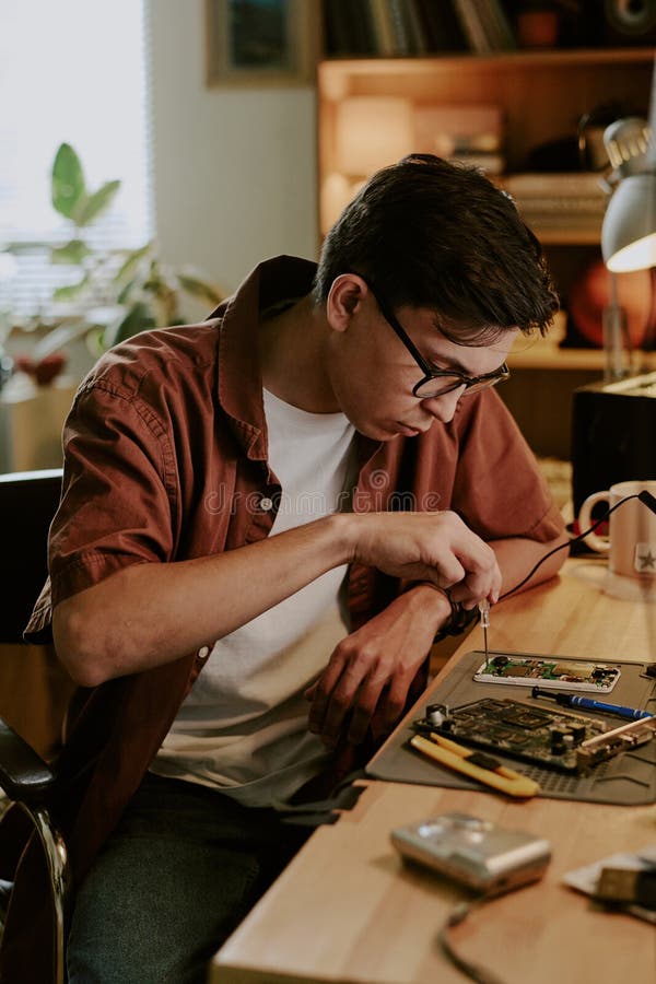 Student Working As Technician Stock Image - Image of work, dorm: 328750905