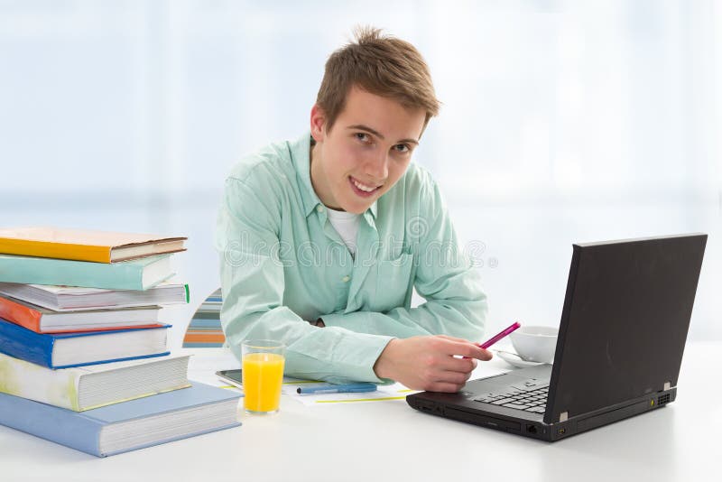 Student Working on Computer Stock Photo - Image of happy, notes: 39417336