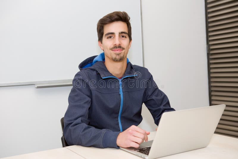 Student Working at Computer Stock Image - Image of laptop, chair: 227872435