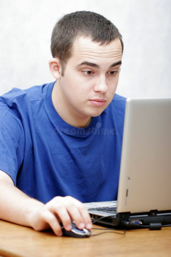 Student Working on His Laptop Stock Photo - Image of sitting, study ...