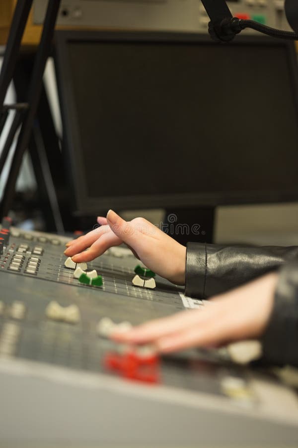 Student Working on Sound Desk Adjusting Levels in the Studio Stock ...