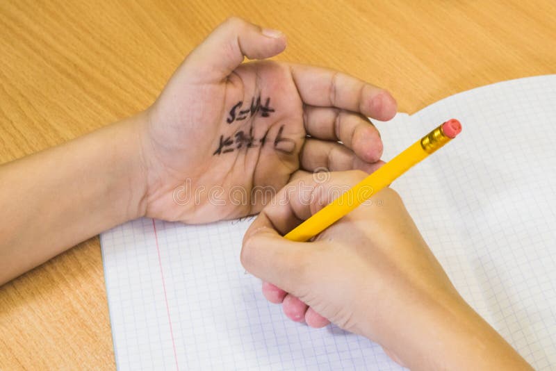 Student Writes Off the Test from the Cheat Sheet Written on the Hand ...