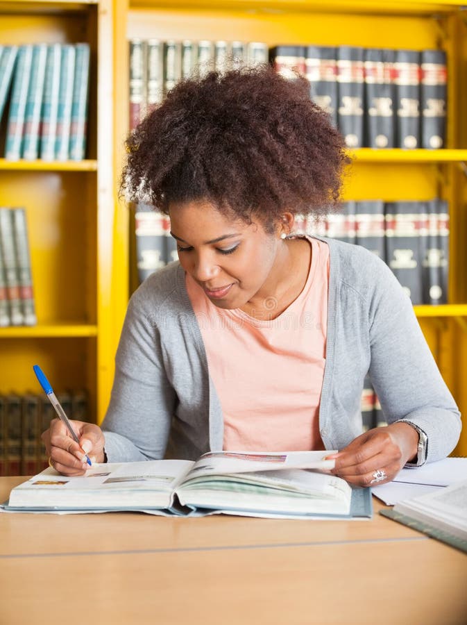 Female College Student Studying Stock Image - Image of librarian, close ...