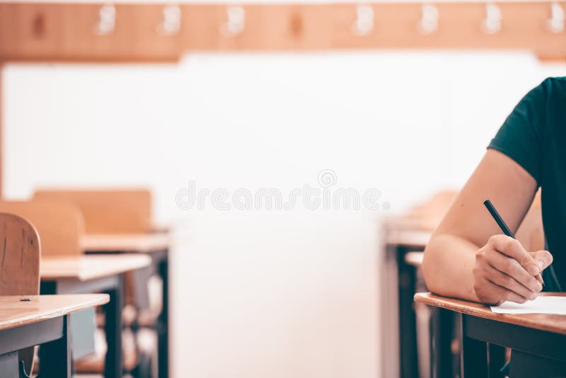 Student Writing Final Exam in Classroom Stock Photo - Image of desk ...
