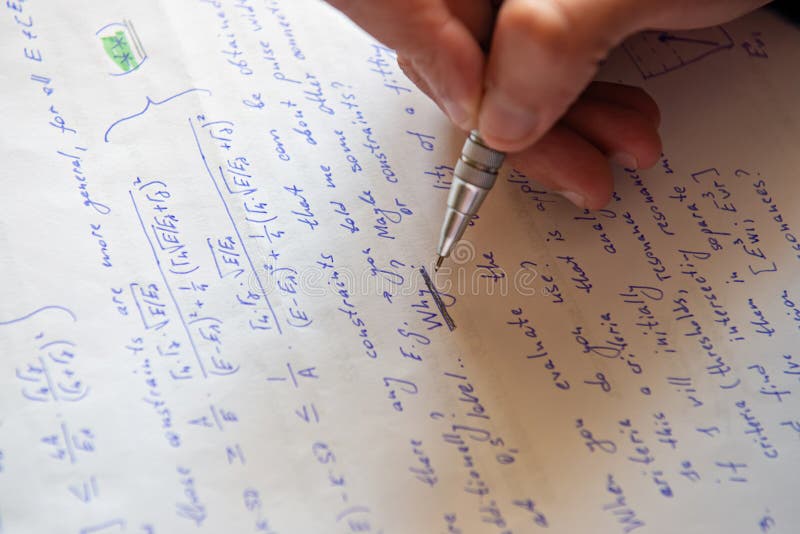 Student Writing Mathematical Calculations on Paper, Closeup Stock Photo ...