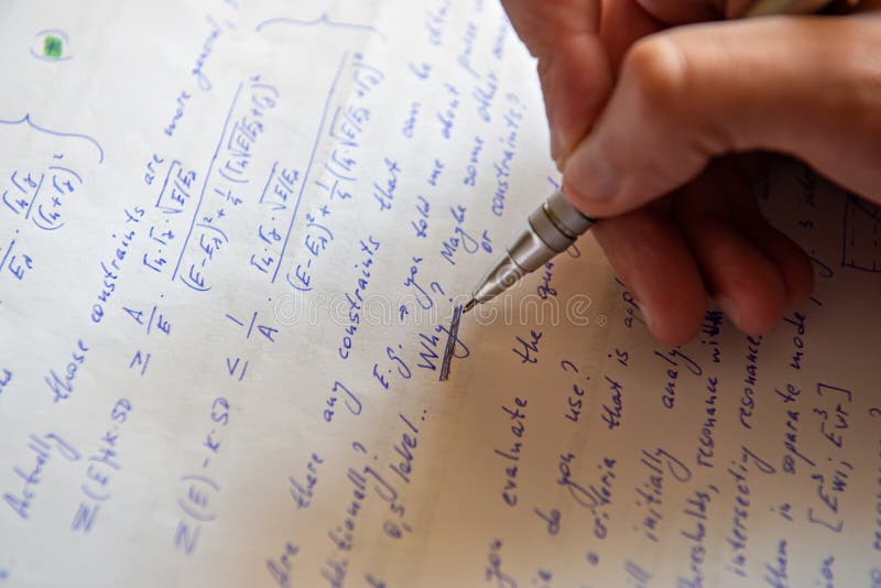 Student Writing Mathematical Calculations on Paper, Closeup Stock Photo ...