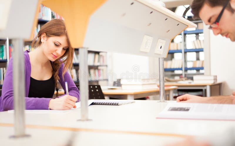 Student Writing on Their Copybooks Stock Image - Image of group ...