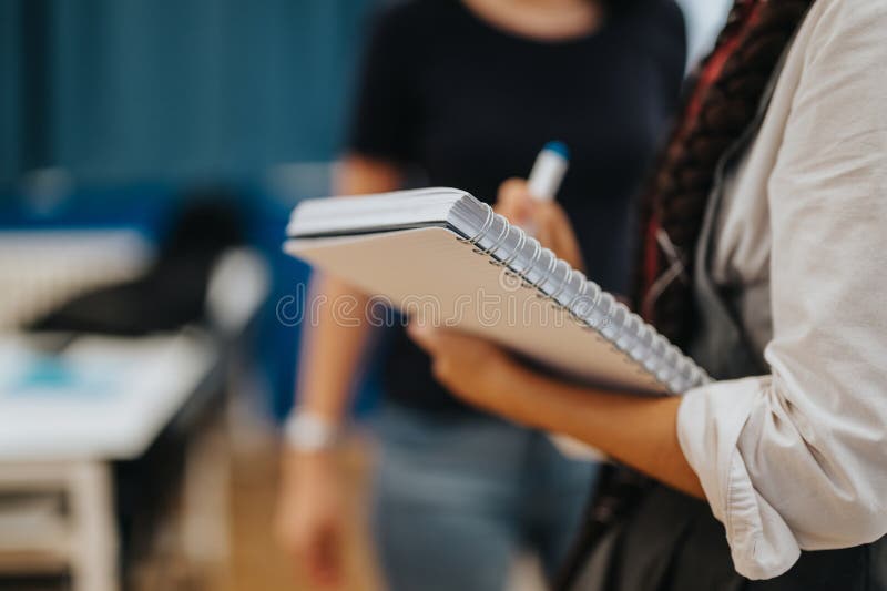 Students in School Taking Notes during a Classroom Lesson Stock Image ...