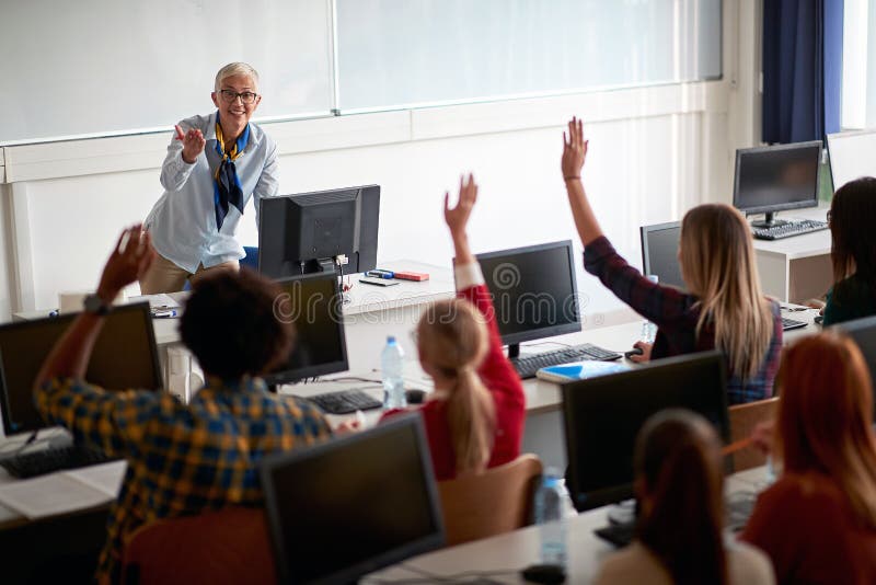 Students Answering Teacher Question Stock Image - Image of school ...