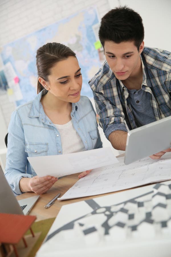 Students in Architecture Working on Project Using Tablet Stock Image ...