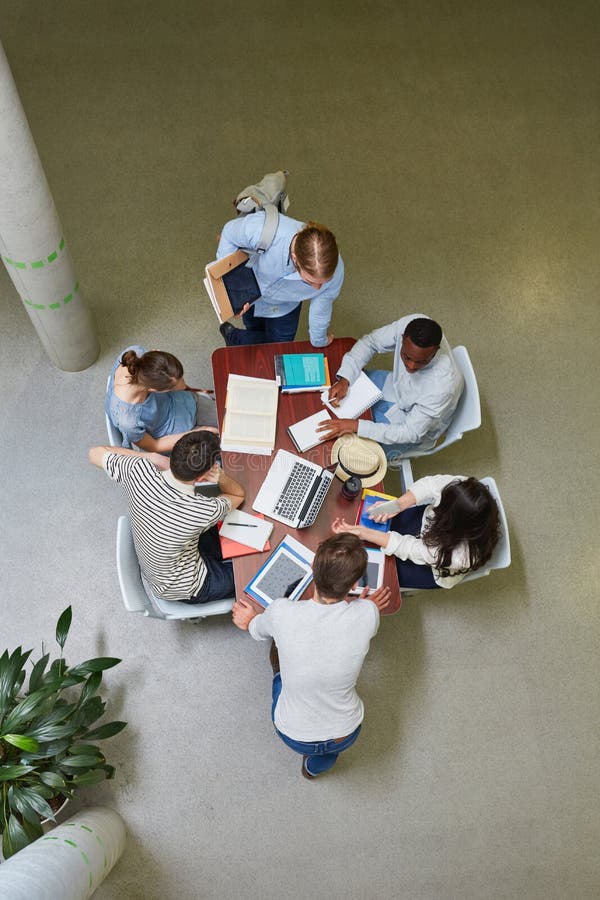 Students Discussing Assignments Stock Photo - Image of discussion ...