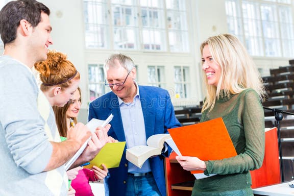 Students Asking Professor in College Auditorium Stock Photo - Image of ...