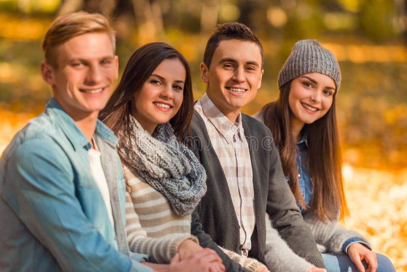 Students in autumn park stock image. Image of class, boys - 64434019