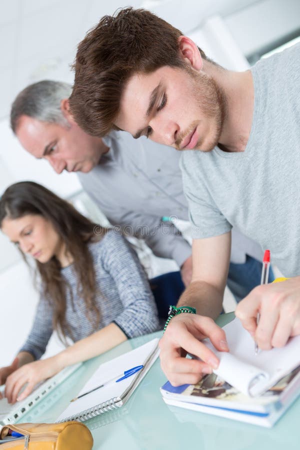 Students Being Supervised by Teacher Stock Photo - Image of students ...