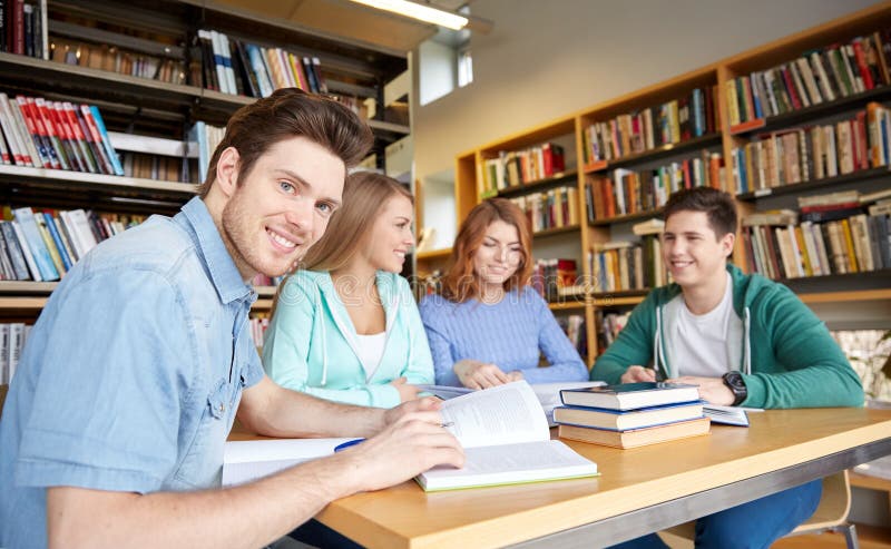 Students with Books Preparing To Exam in Library Stock Photo - Image of ...