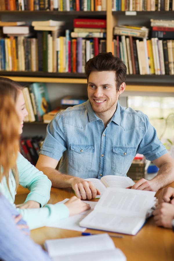 Students with Books Preparing To Exam in Library Stock Photo - Image of ...