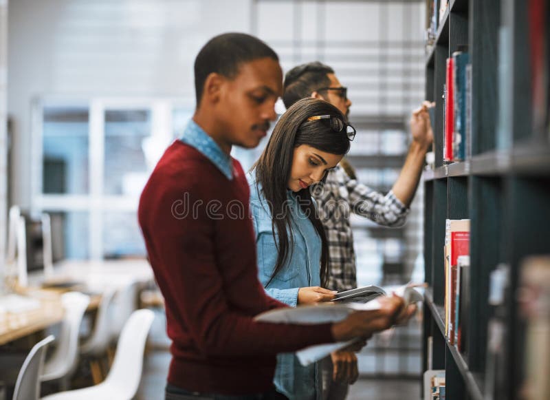 Students, Books and Search on Shelf in Library for Reading, Learning ...