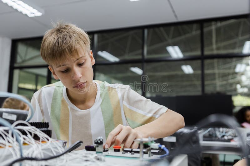 Students Boy Learning Electrical Appliances. Education on Table at ...