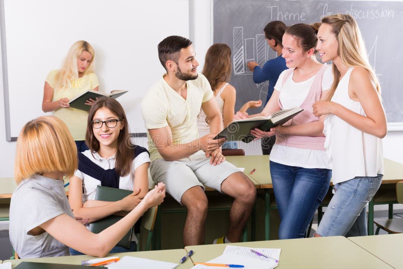 Students Chatting and Smiling at the College Stock Photo - Image of ...