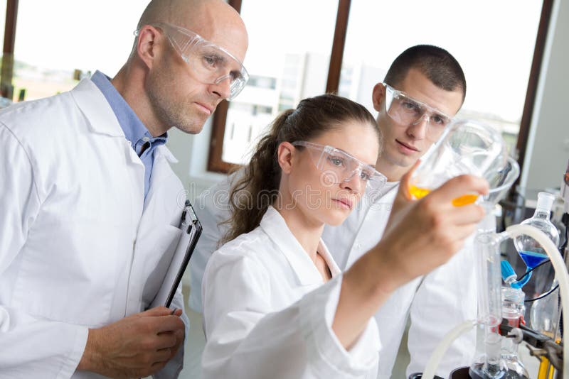 Students in chemistry lab stock image. Image of biology - 92755621