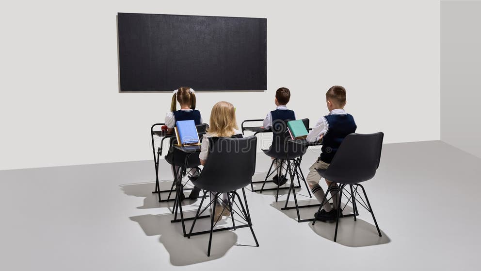 Students, Children Sitting Attentively Facing Chalkboard during ...