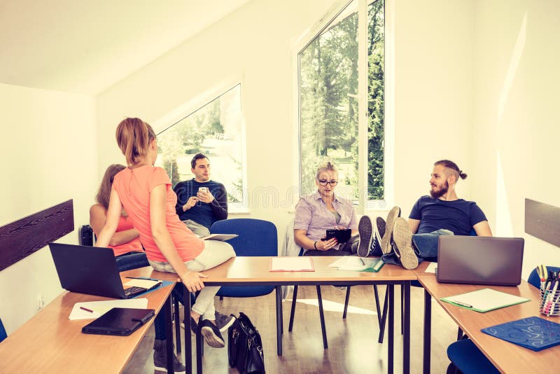 Students in Classroom during the Break Stock Photo - Image of casual ...