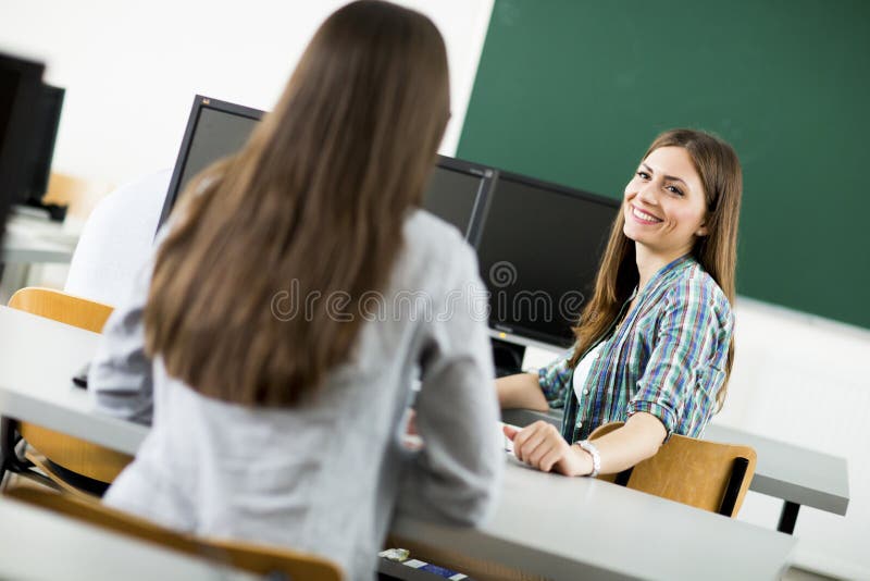 Students in the classroom stock image. Image of female - 53185019