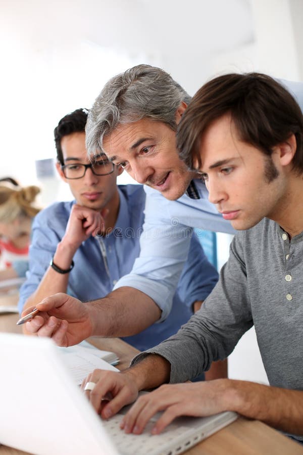 Students in Classroom with Professor Stock Image - Image of internship ...