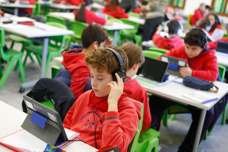 Teacher and Students Using Media and Technology in Classroom Stock ...