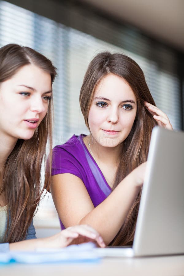 Students in Classroom - Young Pretty Female College Student Stock Image ...
