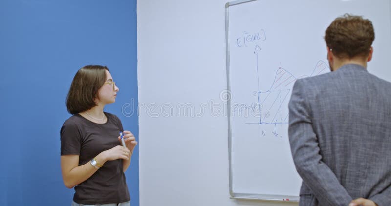 Students Collaborate and Learn from Graph on Whiteboard in University ...