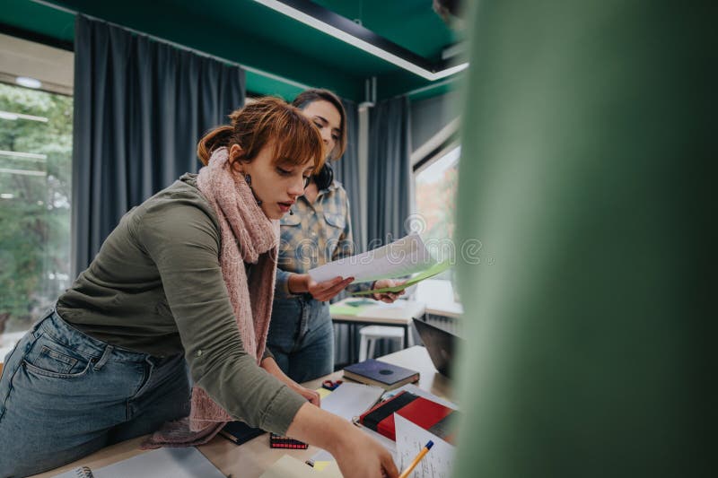 Students Collaborating on Academic Tasks Together in a Classroom ...