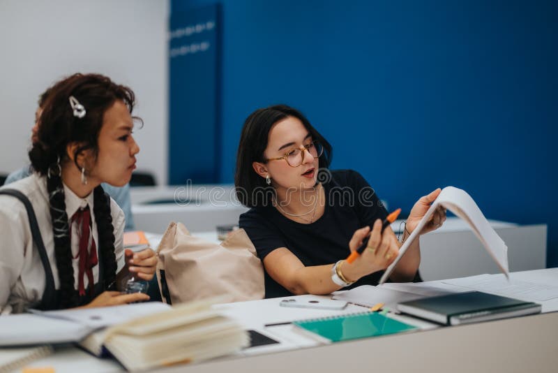 Students Collaborating on Assignments with Guidance from Professor ...