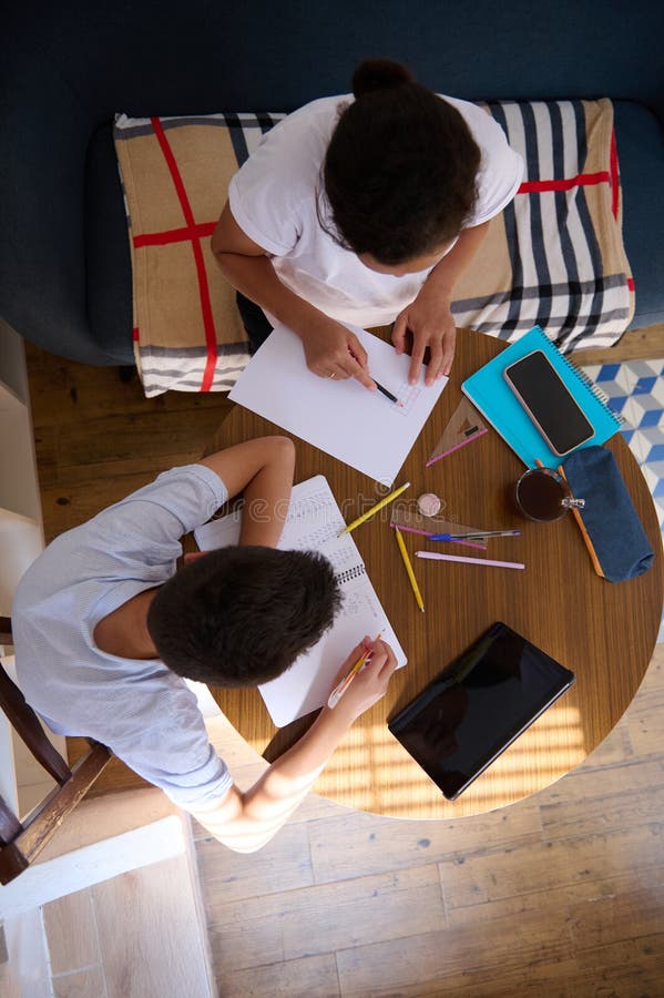 Students Collaborating on a Homework Project at Home Stock Image ...