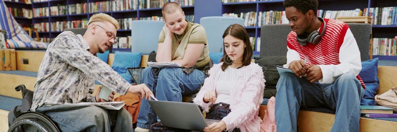 Students Collaborating in a Modern Library Study Area Stock Photo ...