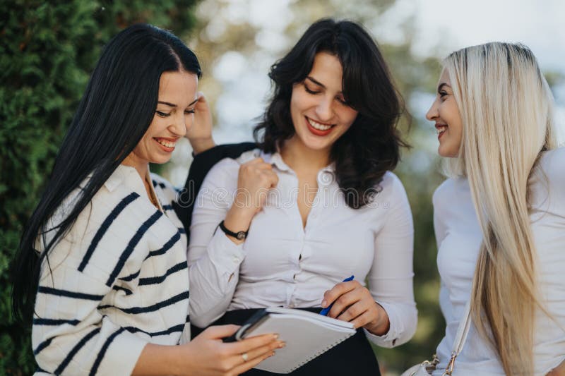 Students Collaborating Outdoors, Discussing and Solving Problems ...