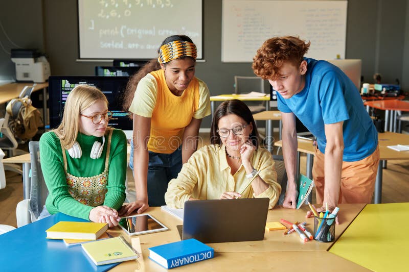 Students Collaborating on Software in Classroom Stock Image - Image of ...