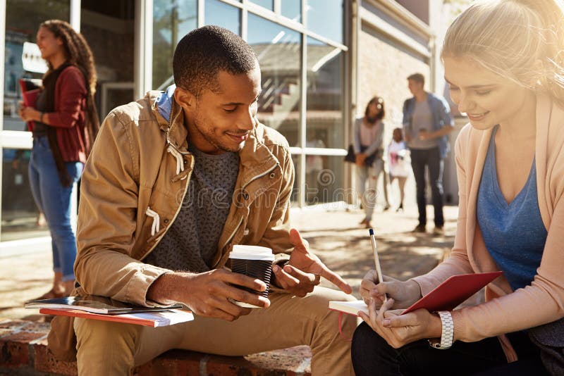 Students, College or Writing in Book Outside Together for Class Notes ...