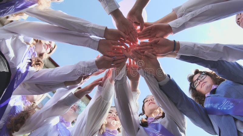 Students Coming Together in a Circle, Celebrating Their Final Day of ...