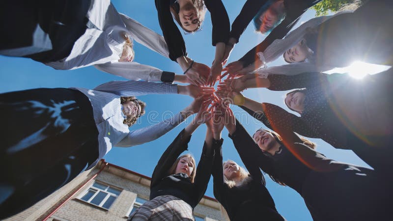 Students Coming Together in a Circle, Celebrating Their School Day ...