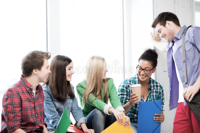 Students Communicating and Laughing at School Stock Photo - Image of ...