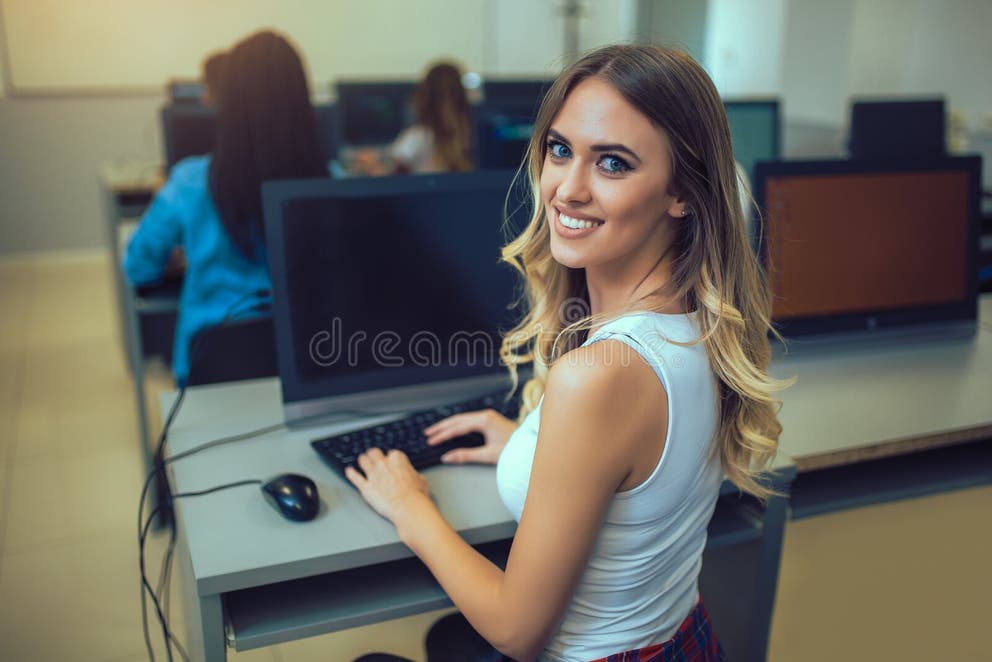 Students in a computer lab stock image. Image of education - 227261763