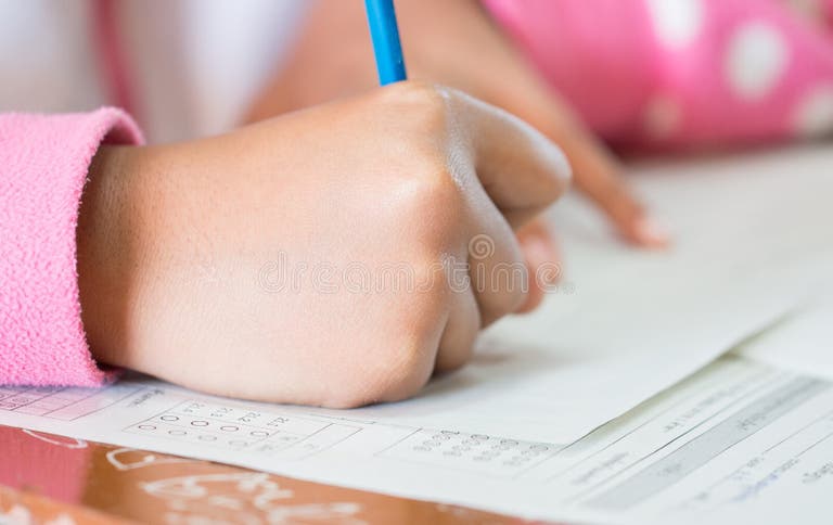 Students Concentration Holding Pencils in Hand Doing Multiple-choice ...