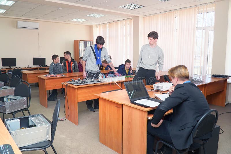 Students Connect Wires Control Panel with Small Test Bench for ...
