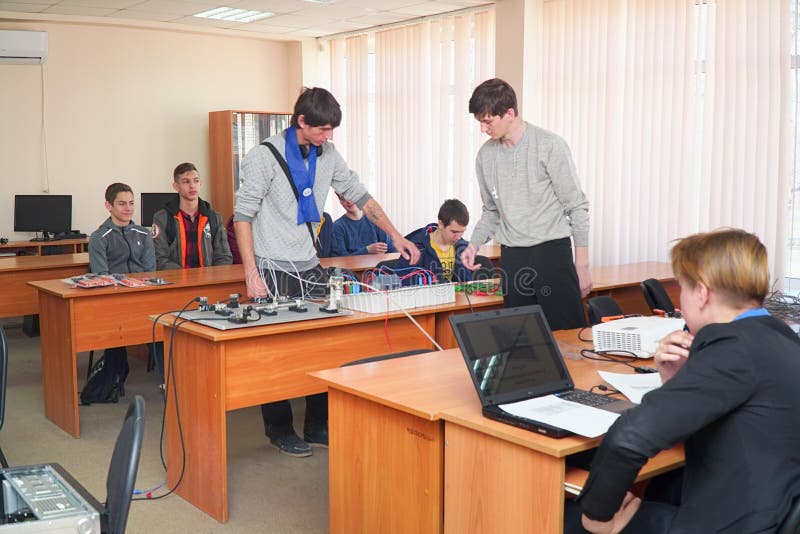 Students Connect Wires Control Panel with Small Test Bench for ...