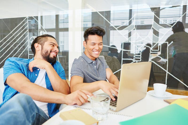 Students Cooperating and Working Stock Image - Image of laptop ...