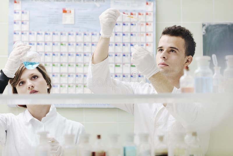 Young Scientist Performing Experiment Stock Photo - Image of caucasian ...